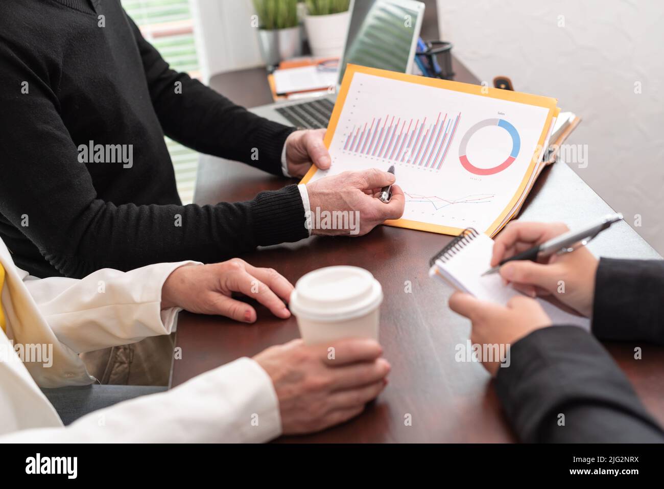 Group of three people working together. Teamwork concept Stock Photo ...