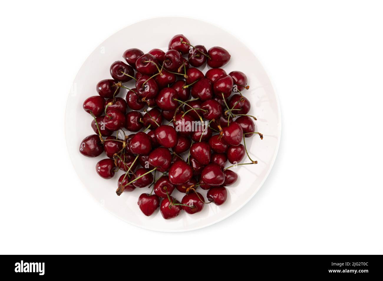 ripe cherries isolated on white background, red sweet fruits on plate ...