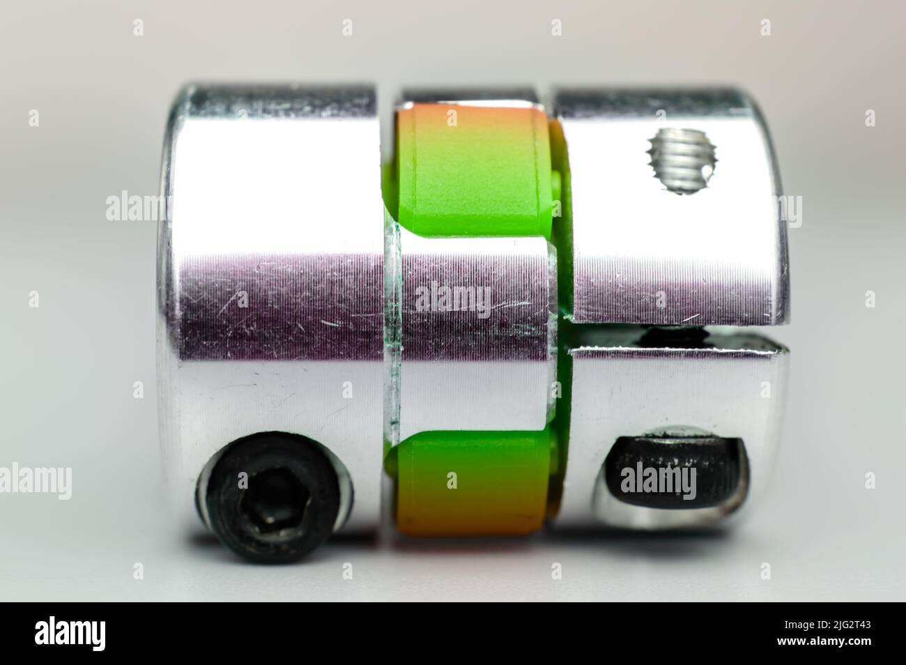 Motor coupling to reduce vibration and smooth start and running of ...