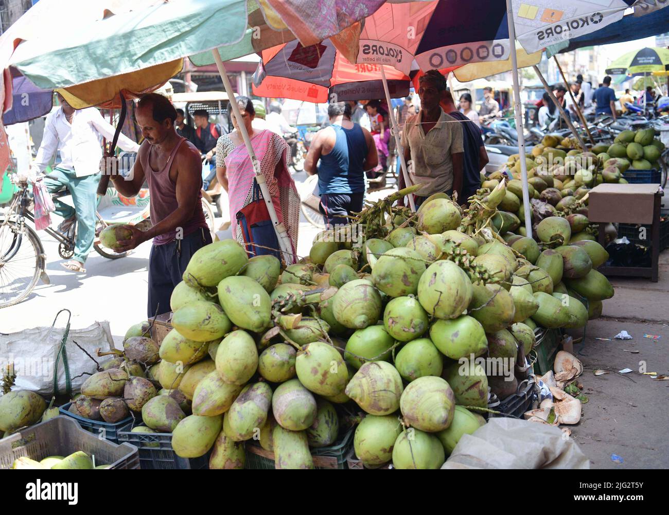 Coconut water drinking indian young hi-res stock photography and images ...
