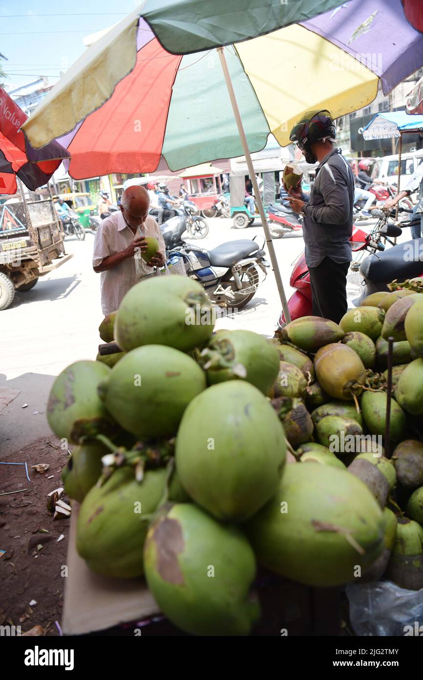 Coconut water drinking indian young hi-res stock photography and images ...