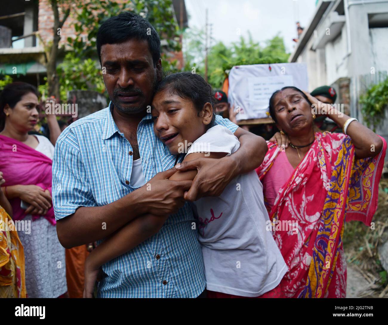 Family members mourn the death of Army Soldier Prashanta Deb, who was ... Family members mourn the death of Army Soldier Prashanta Deb, who was ...