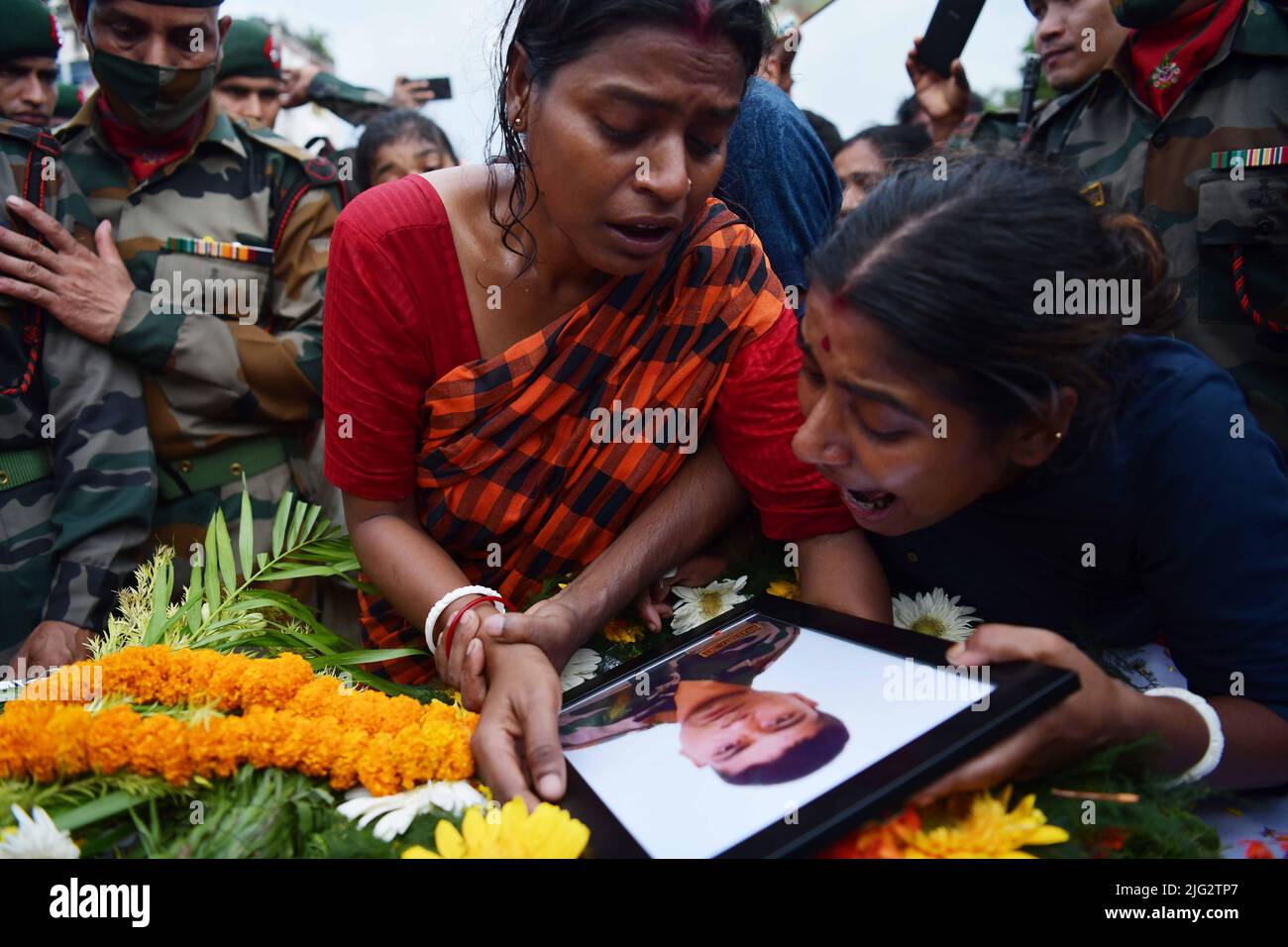 Family members mourn the death of Army Soldier Prashanta Deb, who was ...