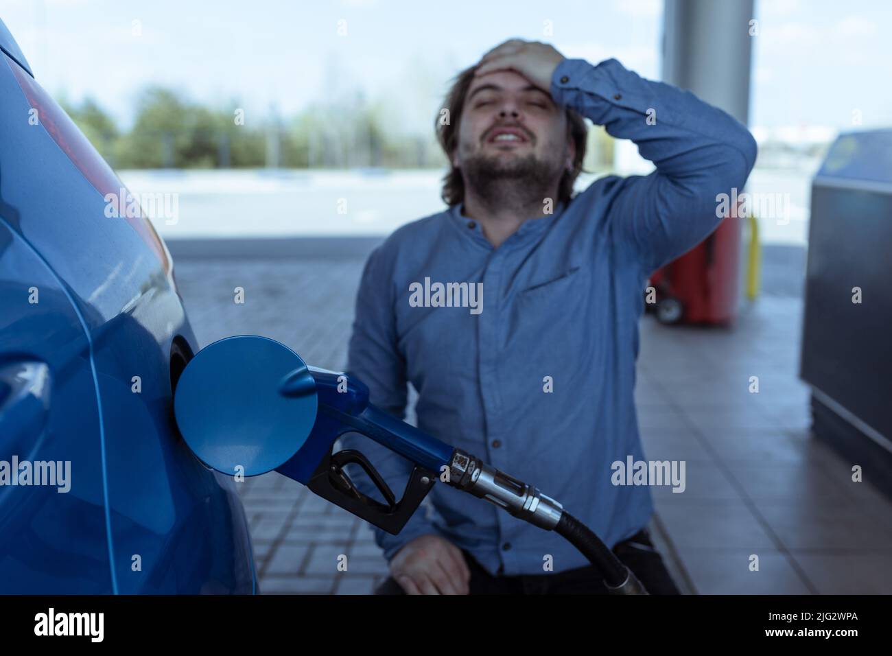 Pain at the gas pump hi-res stock photography and images - Alamy
