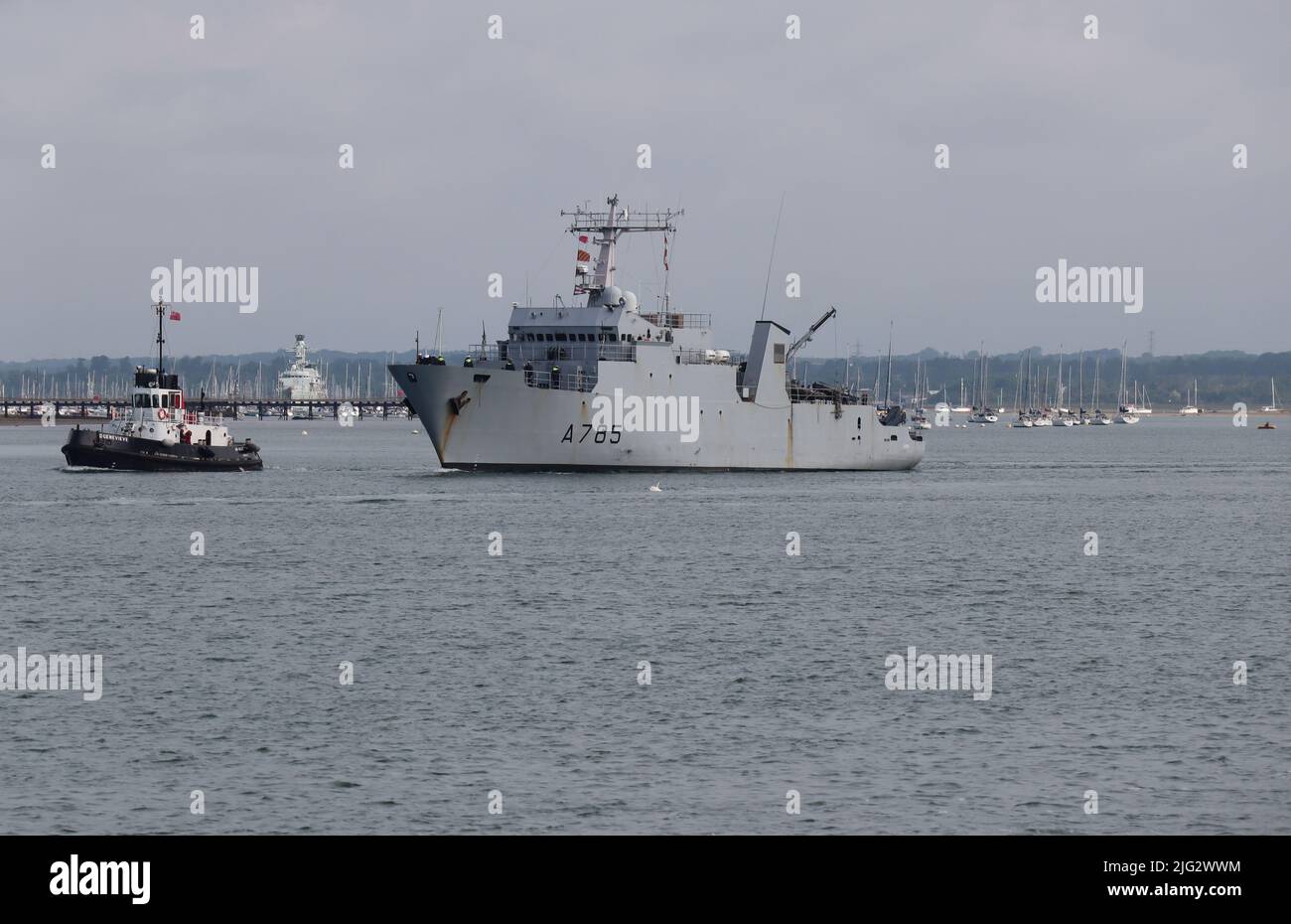 The tug GENEVIEVE ahead of the French naval mine warfare ...