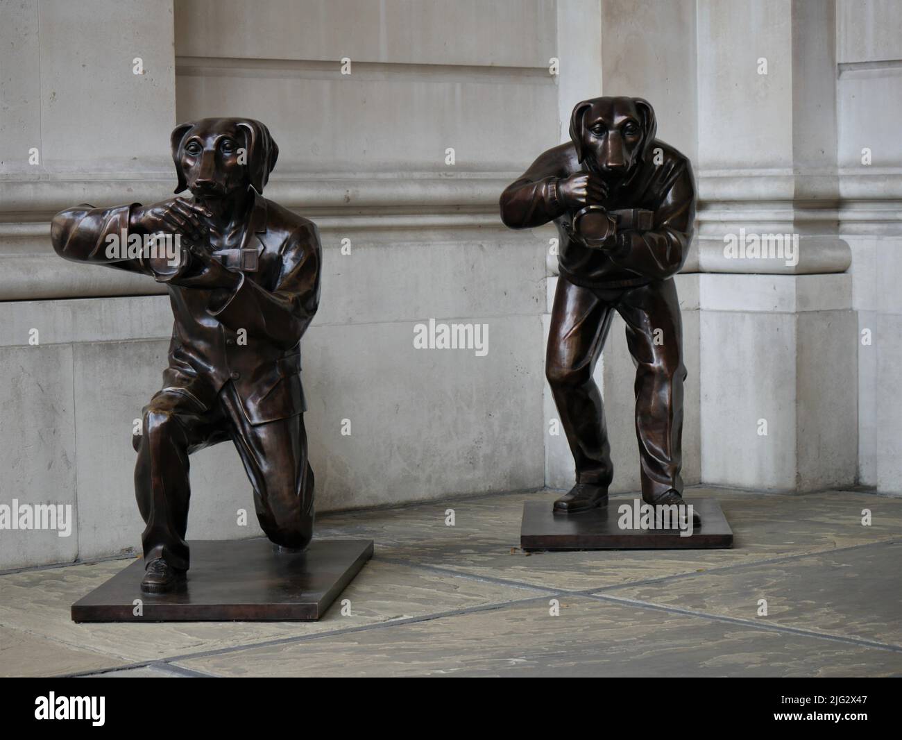 Dogman Statues outside entrance to The Royal Exchange, London Stock ...