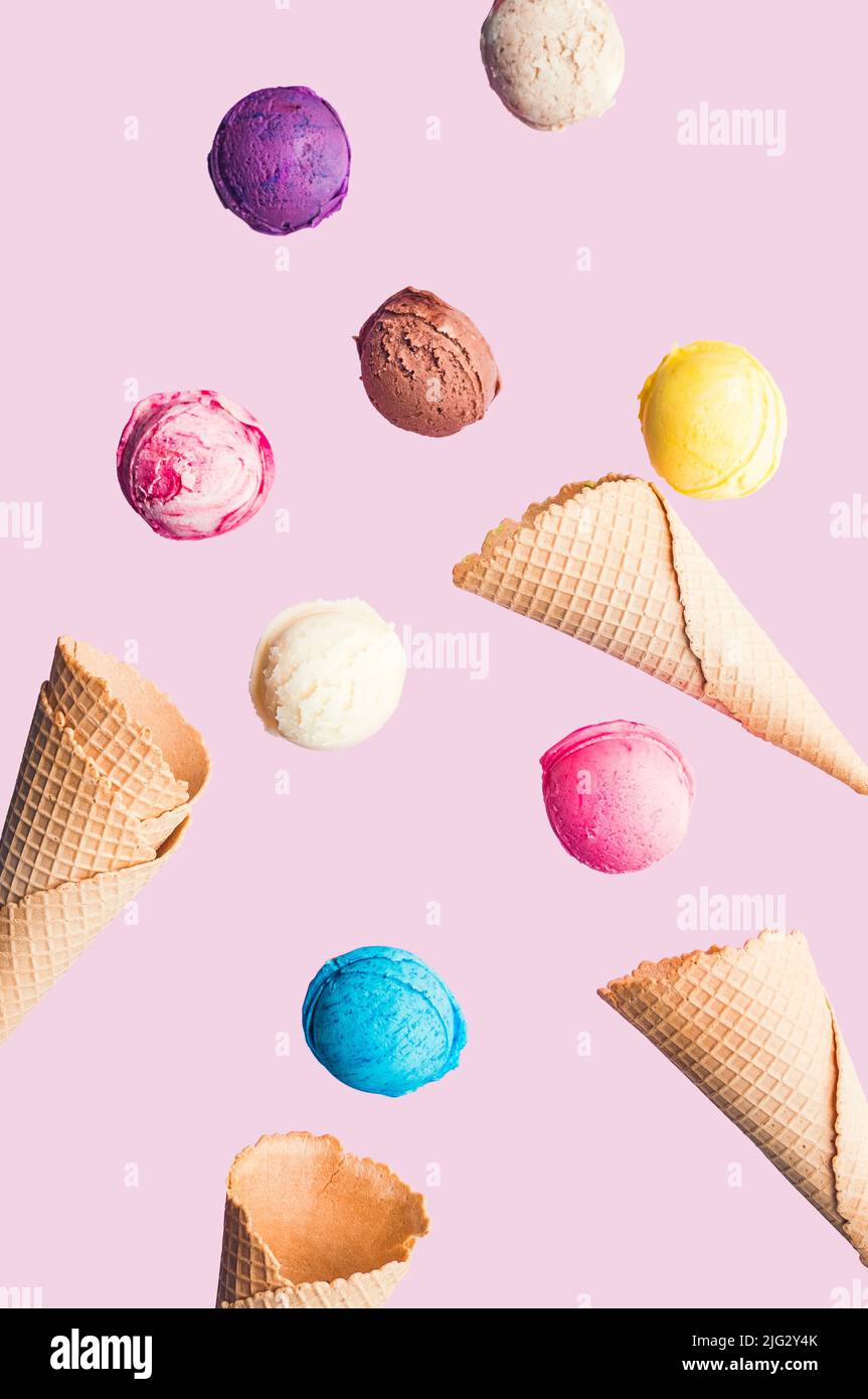 Falling Ice Cream Scoops Into The Vafel Cone On Pink Background Food Levitation Colorful Ice