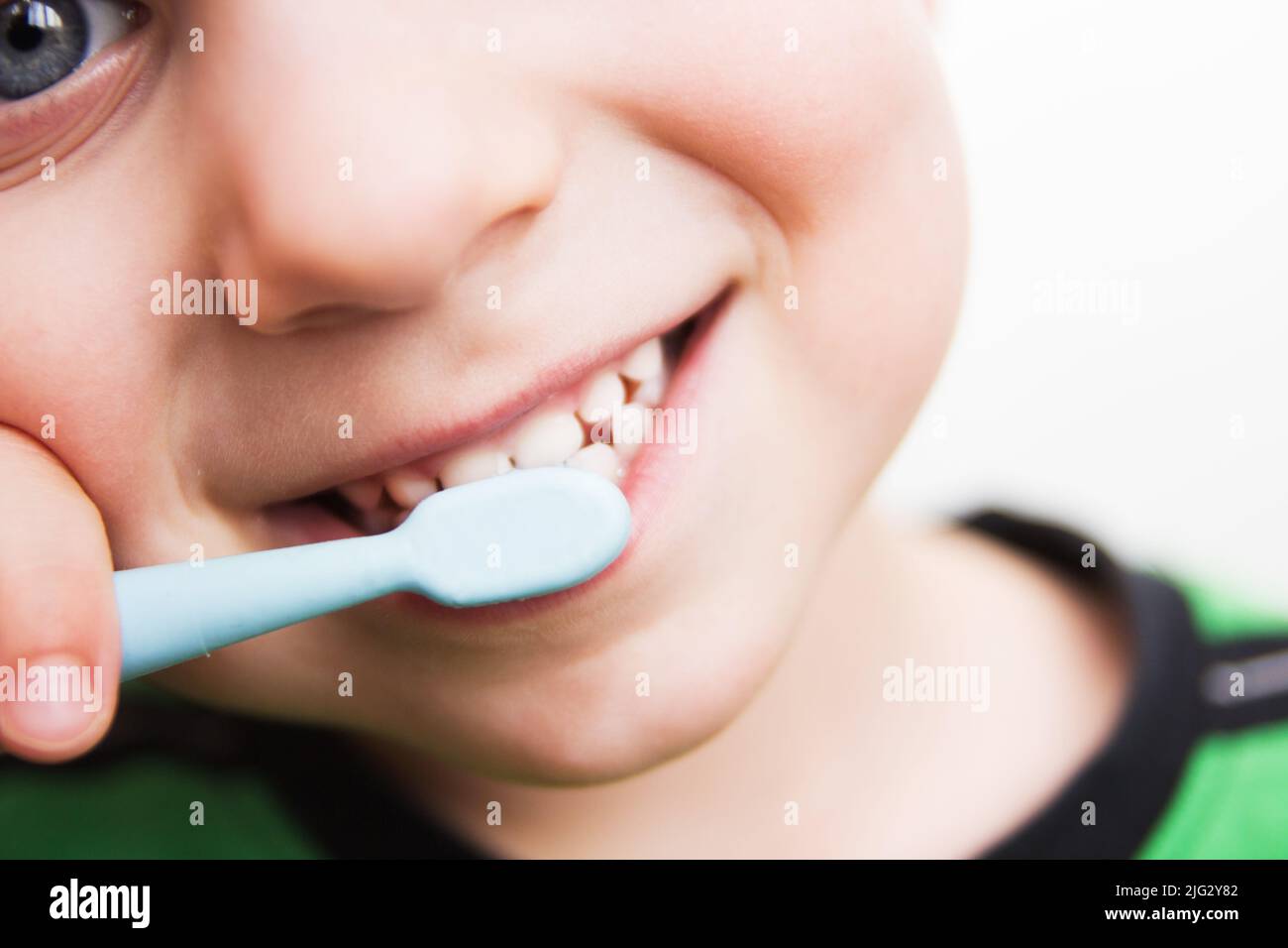 child's teeth with a toothbrush Stock Photo - Alamy