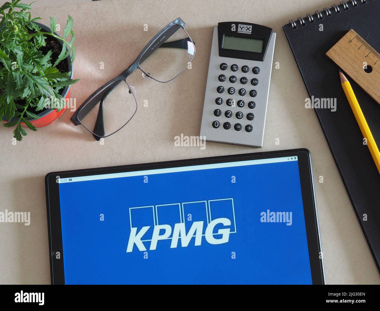 In this photo illustration KPMG International Limited logo seen ...