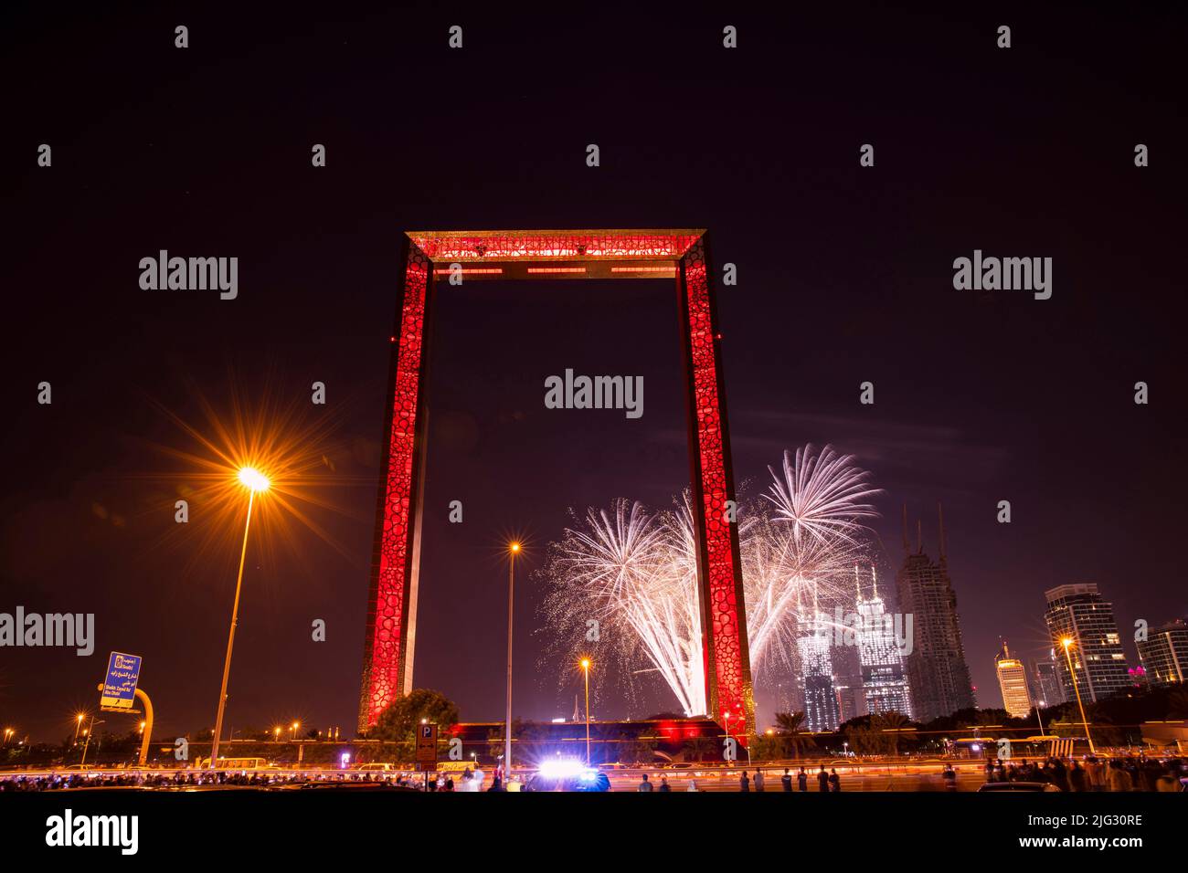 Dubai, UAE - December 31 2020: Fireworks display at Dubai frame during ...