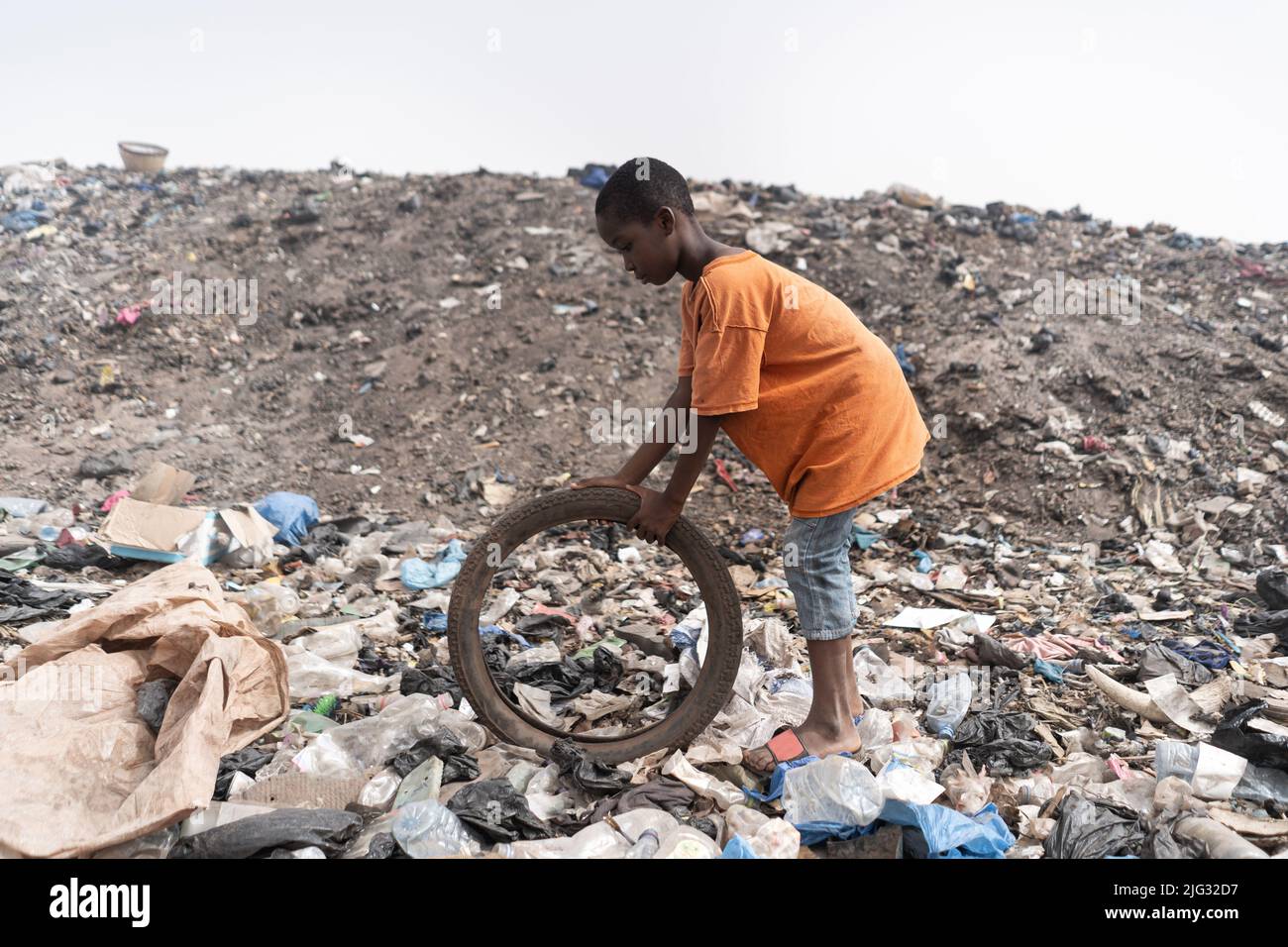 Rubbish picker child hi-res stock photography and images - Alamy