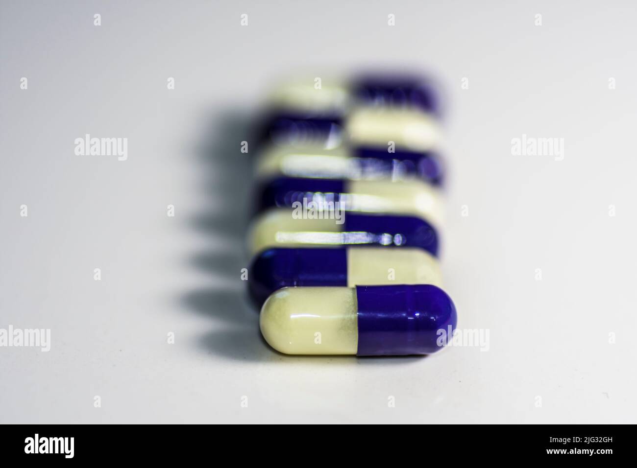 Row of capsules, medicine isolated on white with copy space Stock Photo ...