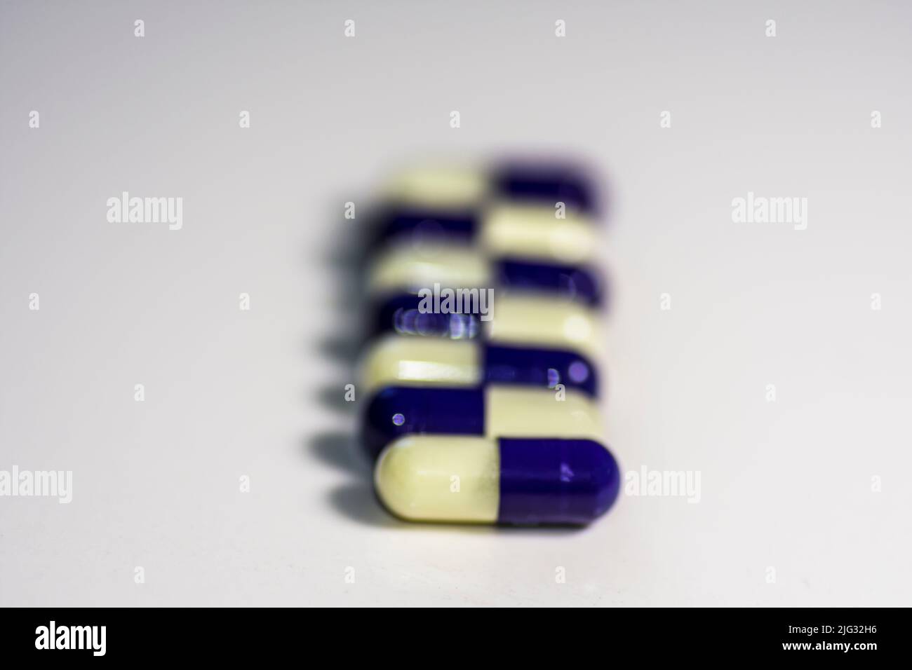 Row of capsules, medicine isolated on white with copy space Stock Photo ...