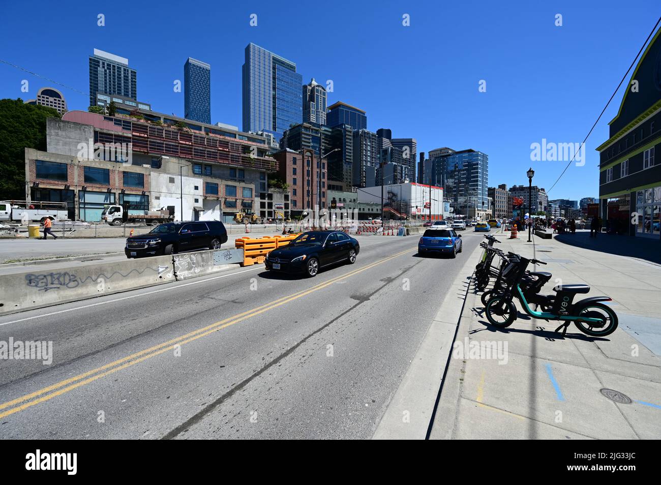 A sidewalk view of some tall buildings in Seattle Stock Photo - Alamy