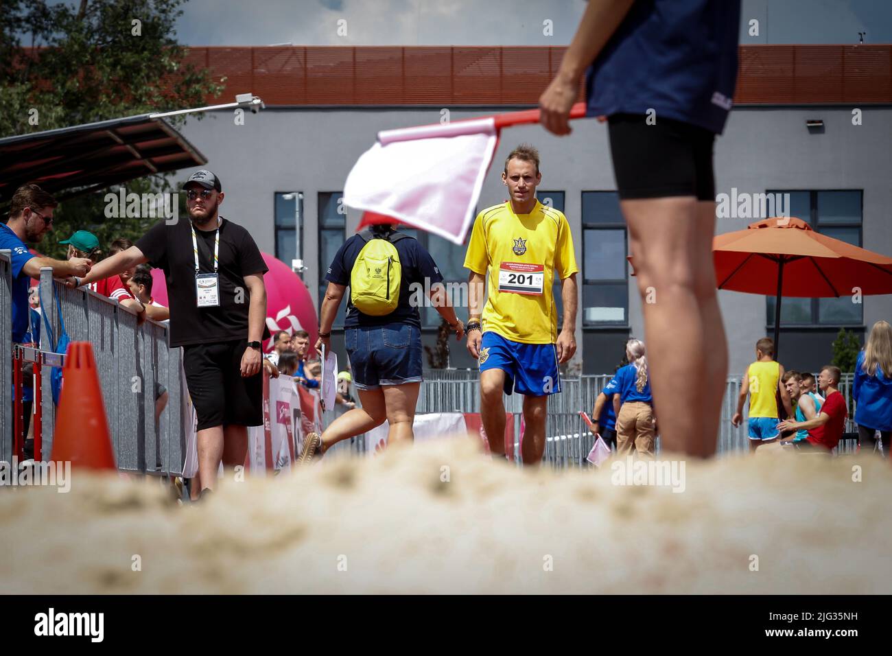 An athlete from Ukraine competes in Long Jump discipline during Polish ...