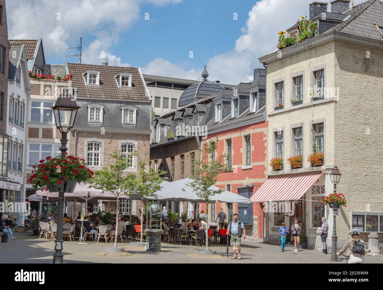 Aachen June 2022: the square "Münsterplatz" in the old part of the town ...