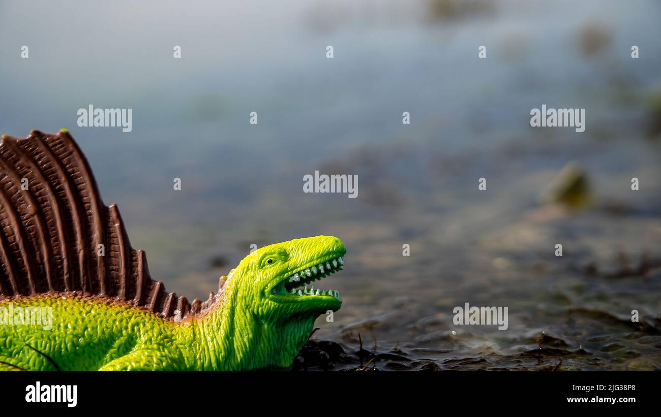 Green dino hi-res stock photography and images - Alamy