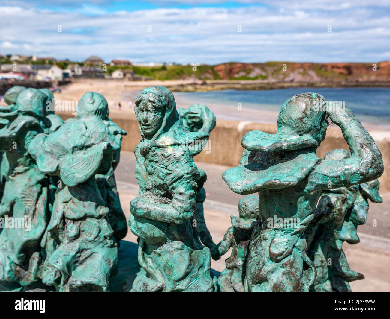 Fishing disaster memorial statue of miniature figures of widows and ...
