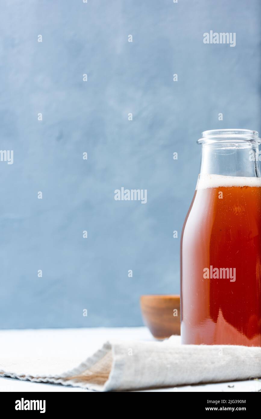 Kombucha in bottle, food background Stock Photo - Alamy