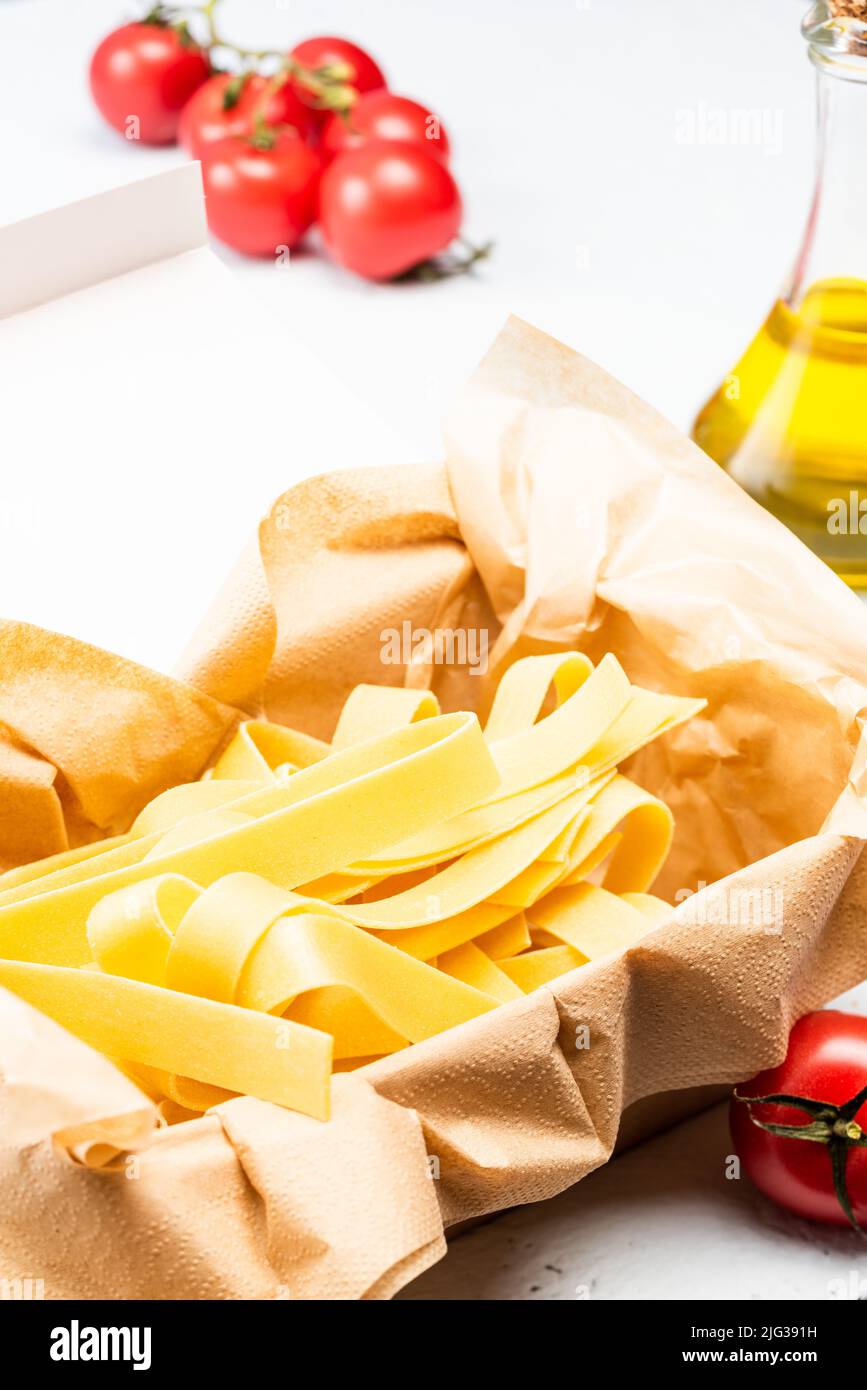 Homemade pasta in box Stock Photo - Alamy