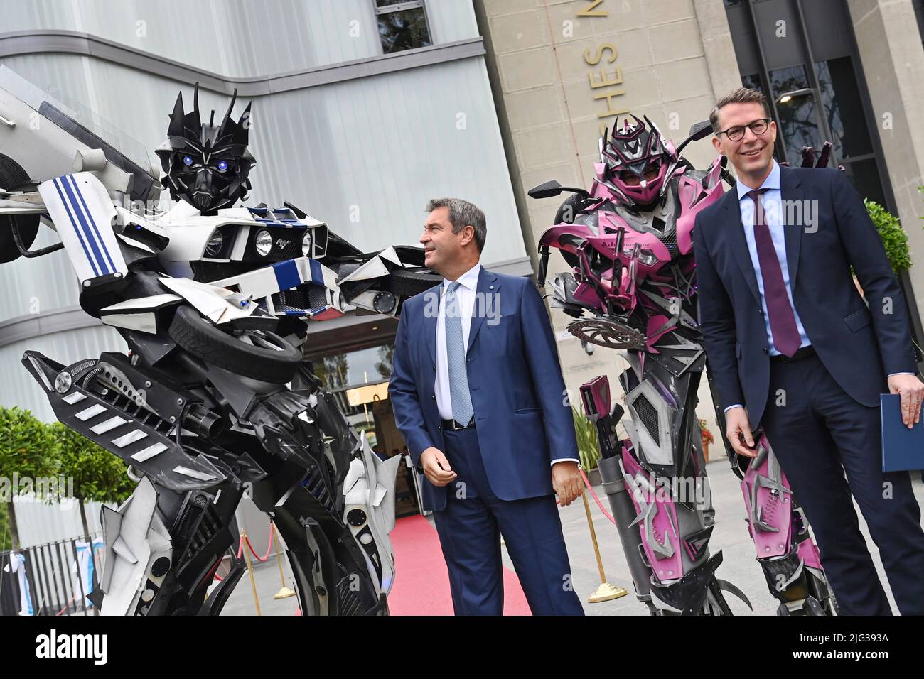 Munich, Germany. July 7th, 2022: Two Transformer robots welcome Markus ...