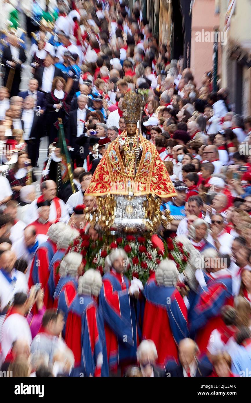 People attend the San Fermin procession during the traditional San ...