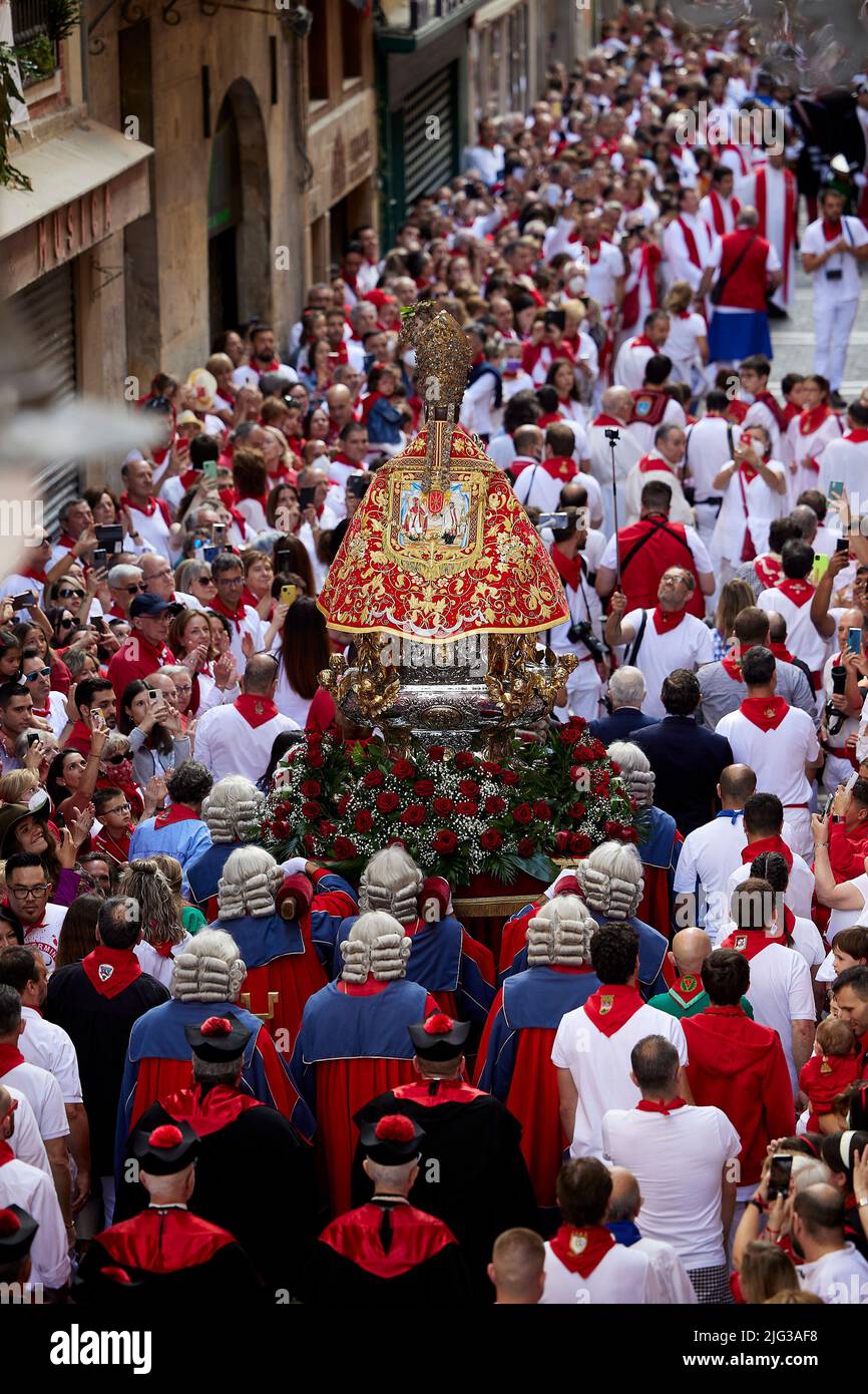 People attend the San Fermin procession during the traditional San ...