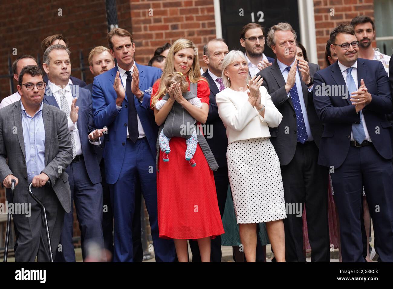 Carrie Johnson holding her daughter Romy watches Prime Minister Boris ...
