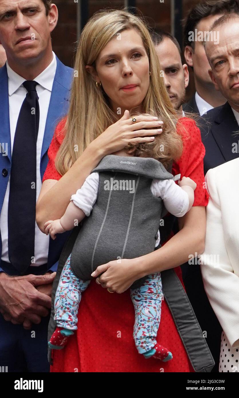 Carrie Johnson, the wife of Prime Minister Boris Johnson, cradles their ...