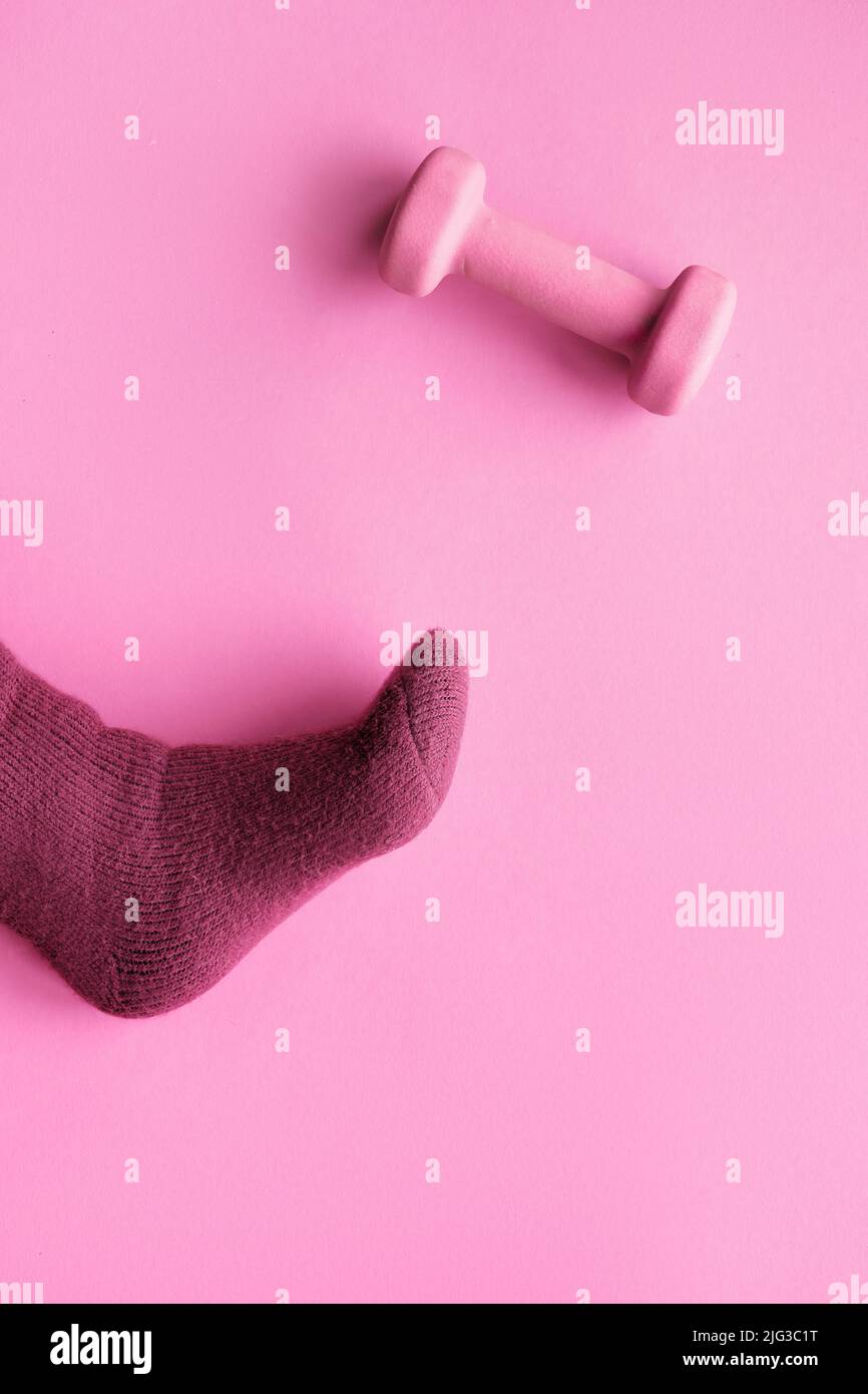 Pink magenta monochrome abstract paper background with foot in warm ...