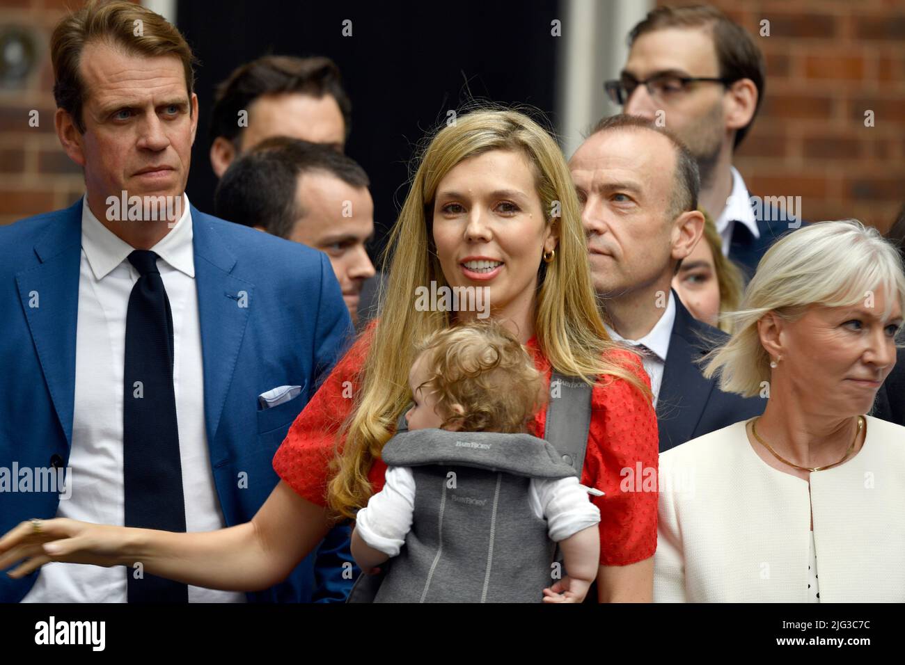 Carrie Johnson, holding daughter Romy, watches Prime Minister Boris ...