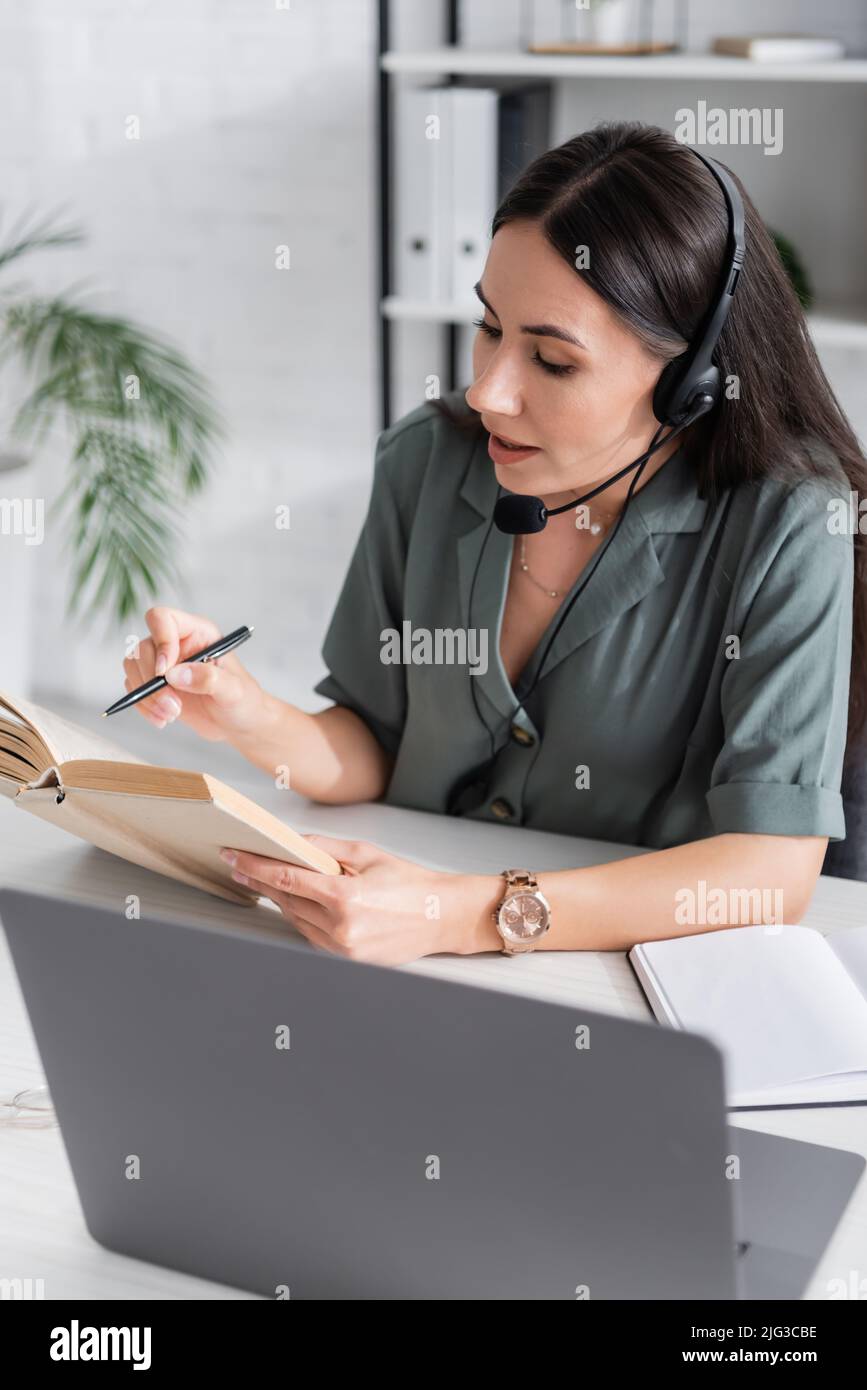 Woman microphone book hi-res stock photography and images - Alamy