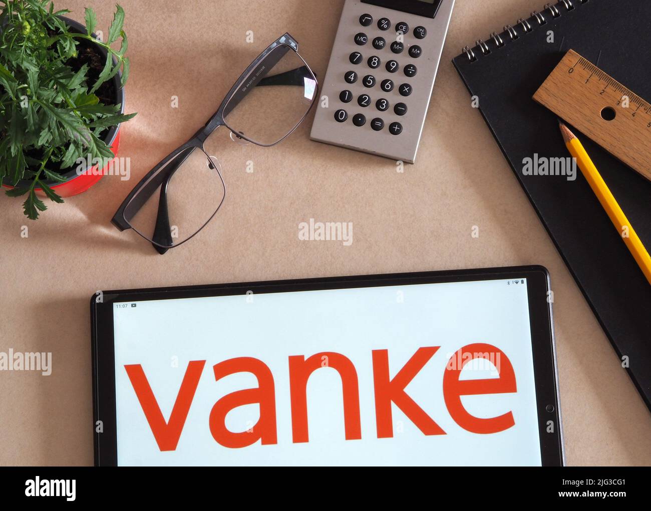 In this photo illustration, Vanke Co., Ltd. logo seen displayed on a ...