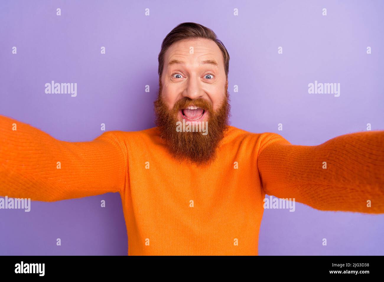 Photo of laughing crazy foxy man blogger take selfie making video from ...