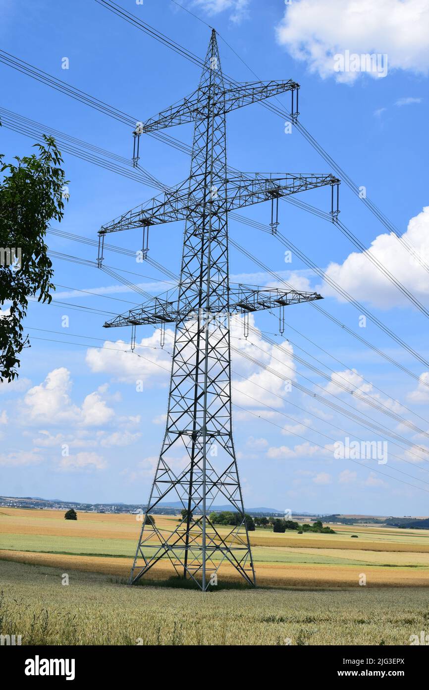 electric pylon in the fields Stock Photo - Alamy