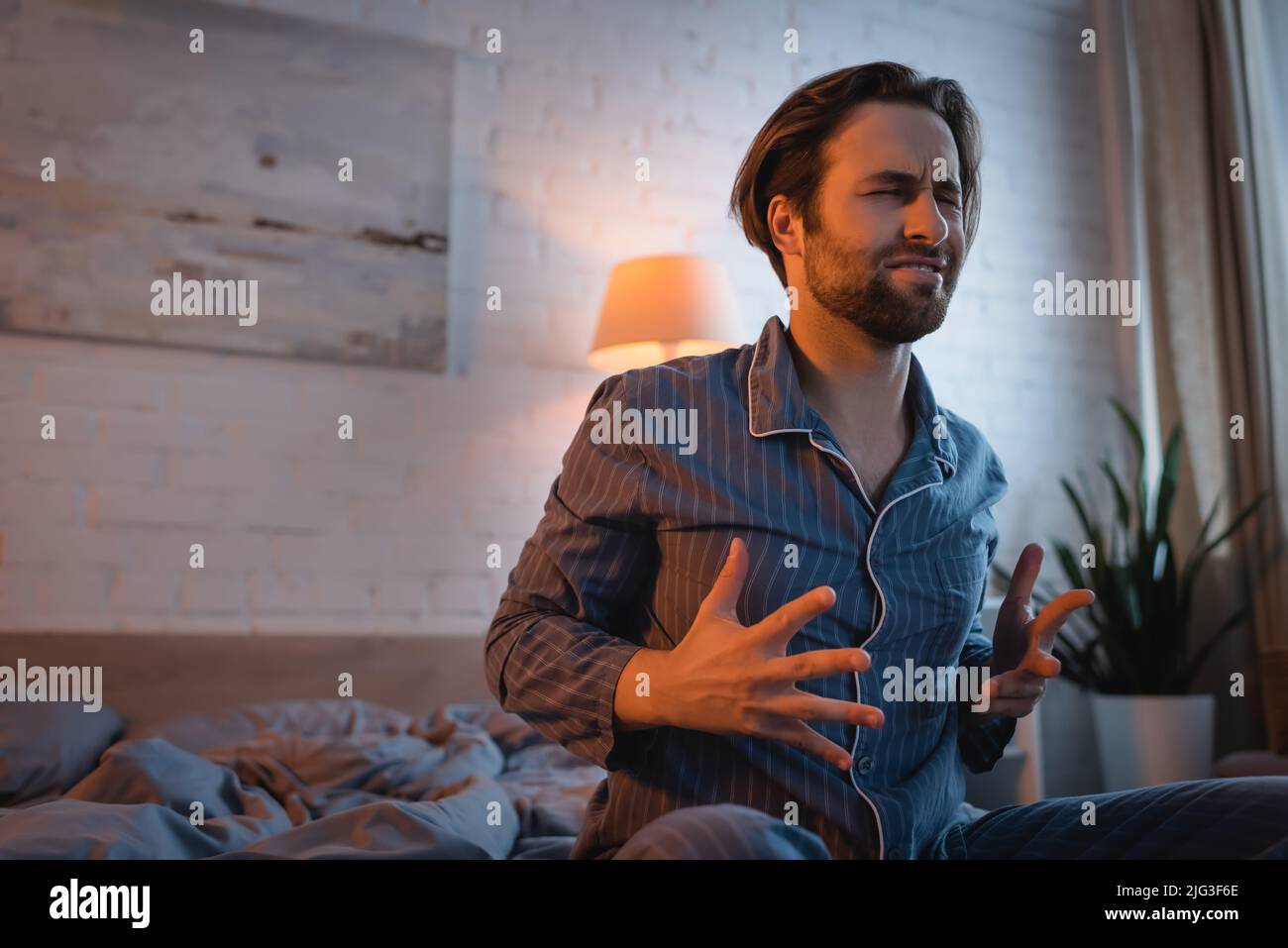 Tensed young man hi-res stock photography and images - Alamy