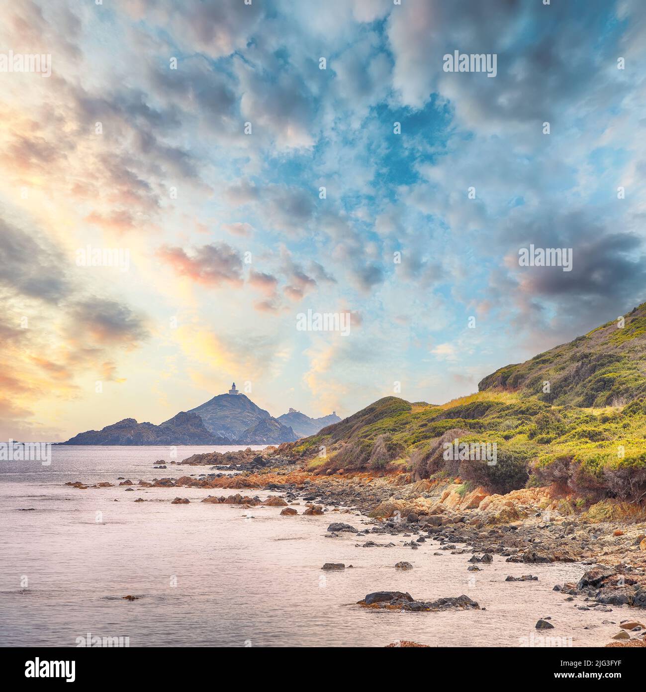 Sunset over popular tourist destination Torra di a Parata with Genoese ...