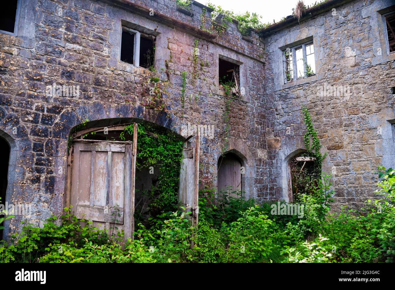 Pointed arches of the stables of Gothic Revival Charleville Castle ...
