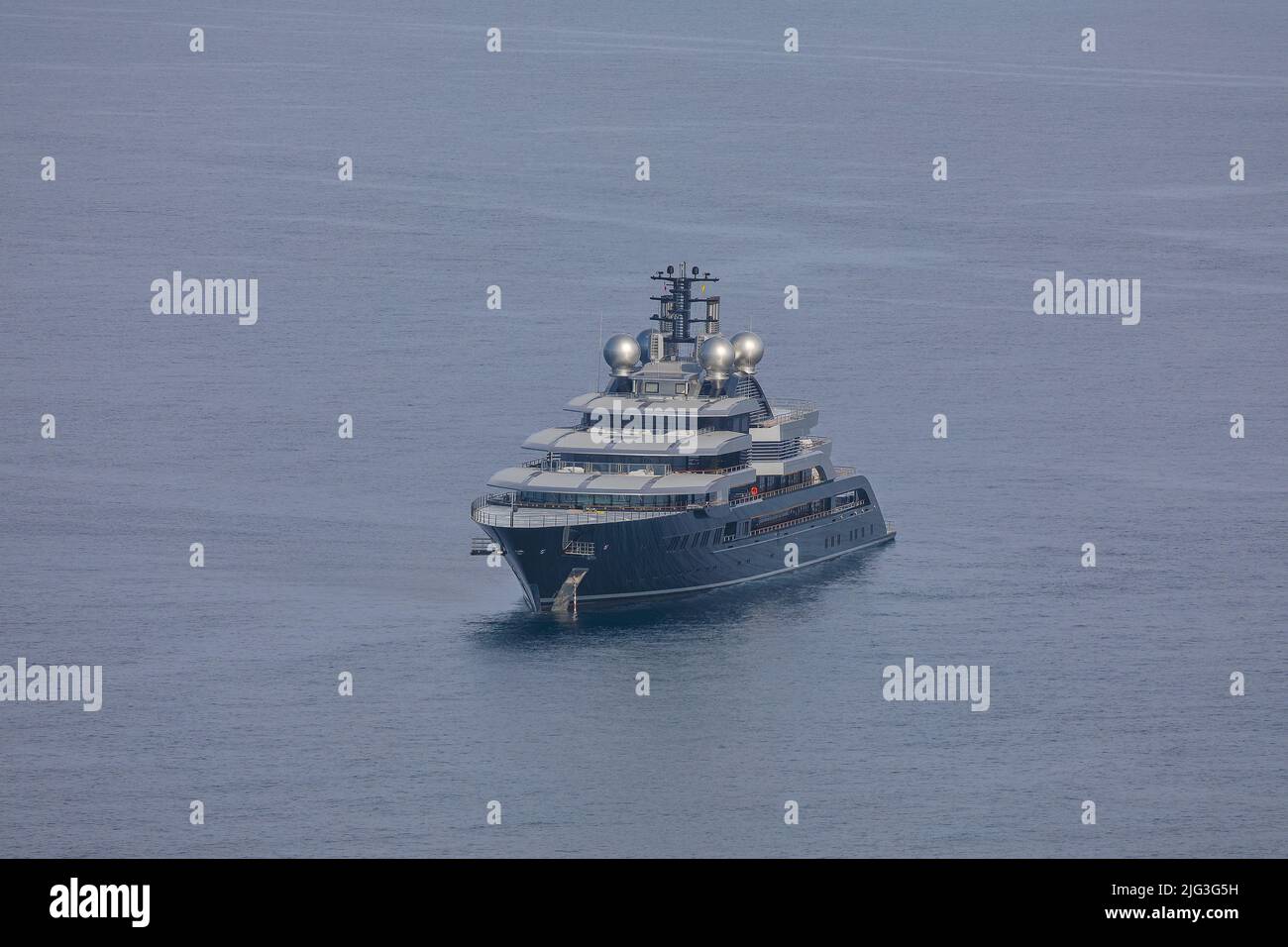 Luxury motor yacht on the ocean at sunset. A large private motor yacht ...