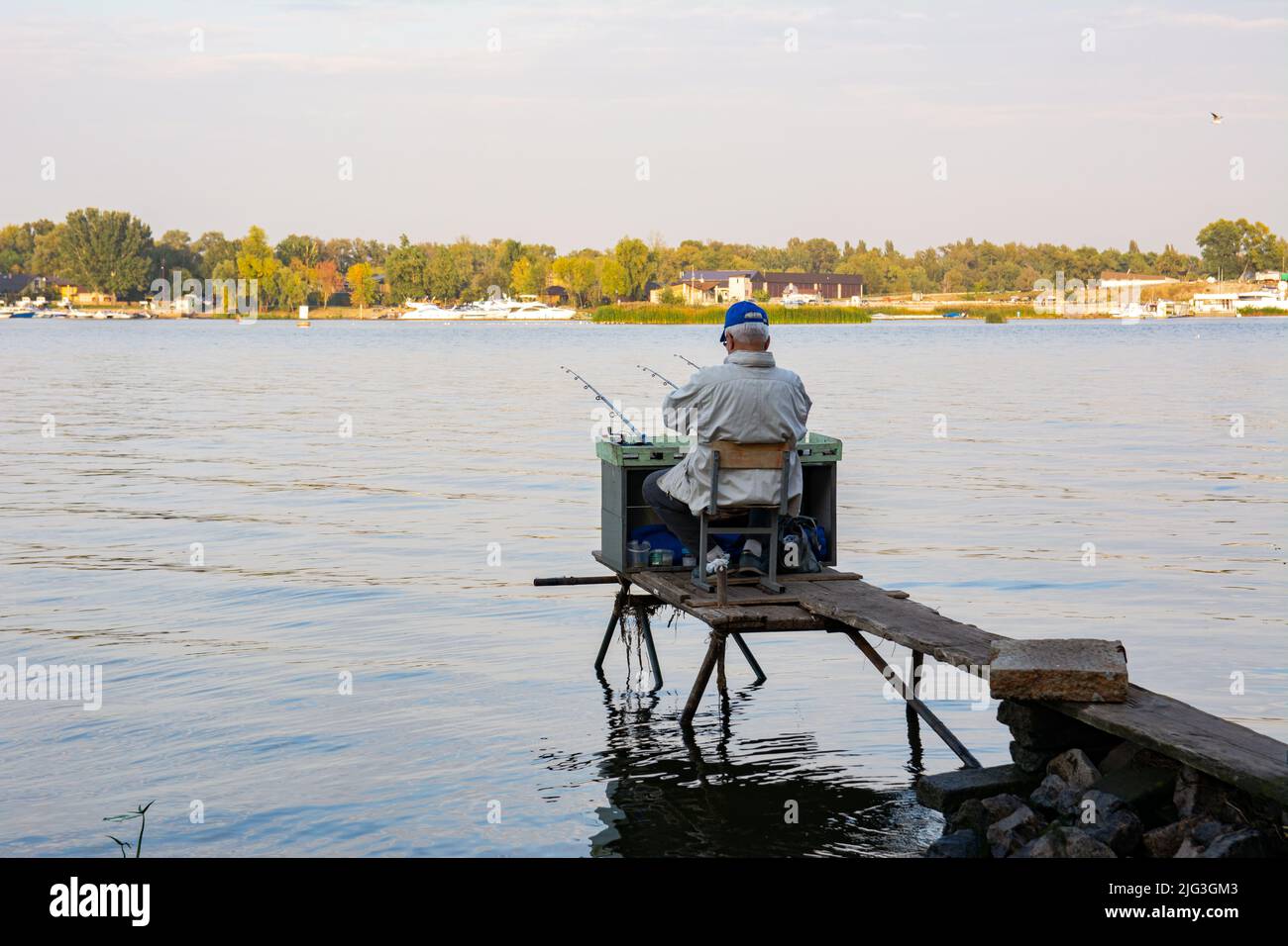 Back view man sitting river hi-res stock photography and images - Alamy