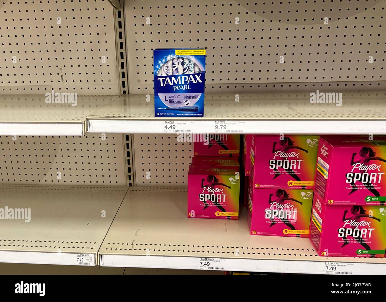 Empty space on shelves at a Target store show the current tampon ...
