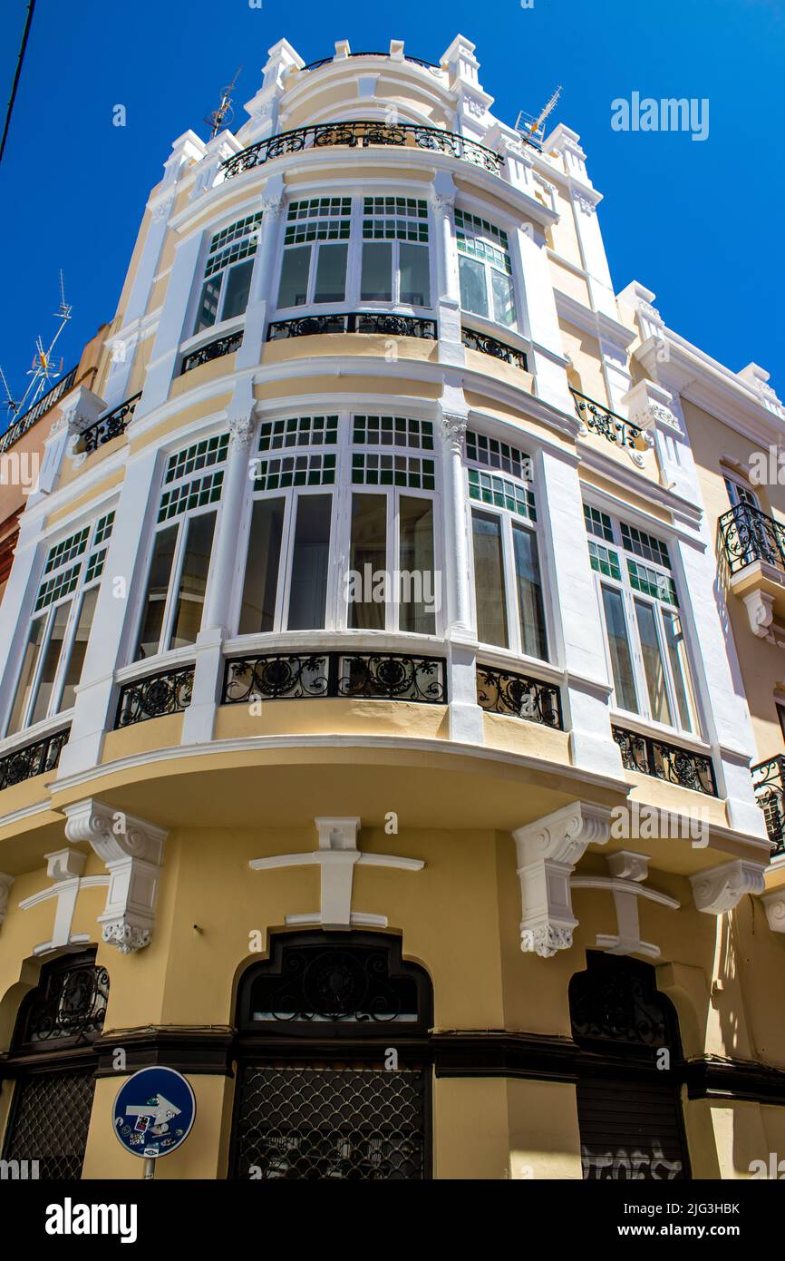 Seville, Spain - July 04, 2022 Facade of a building in the streets of ...