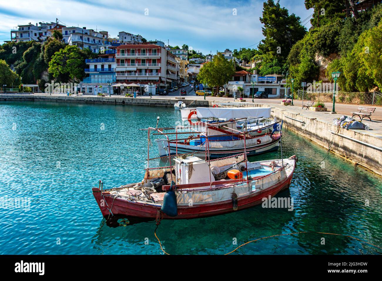 Traditional fishing boats at the picturesque port of Patitiri in ...