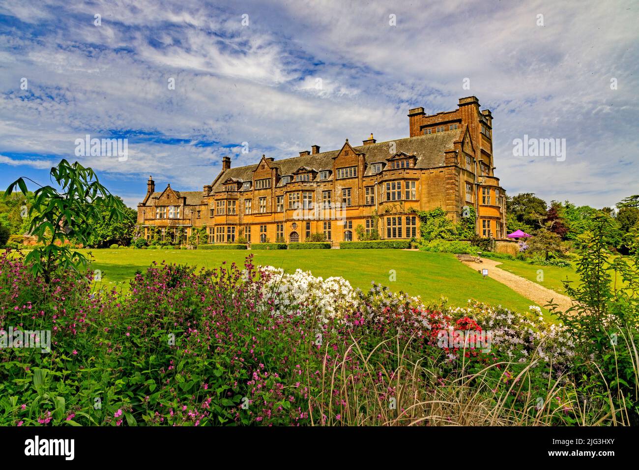 Sunlight brightens the south front of Minterne House, built in 1906 ...