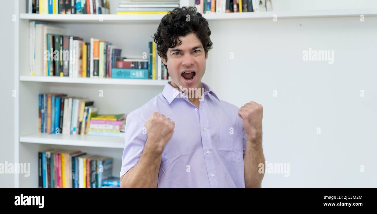 Successful caucasian businessman ith black hair at office Stock Photo ...