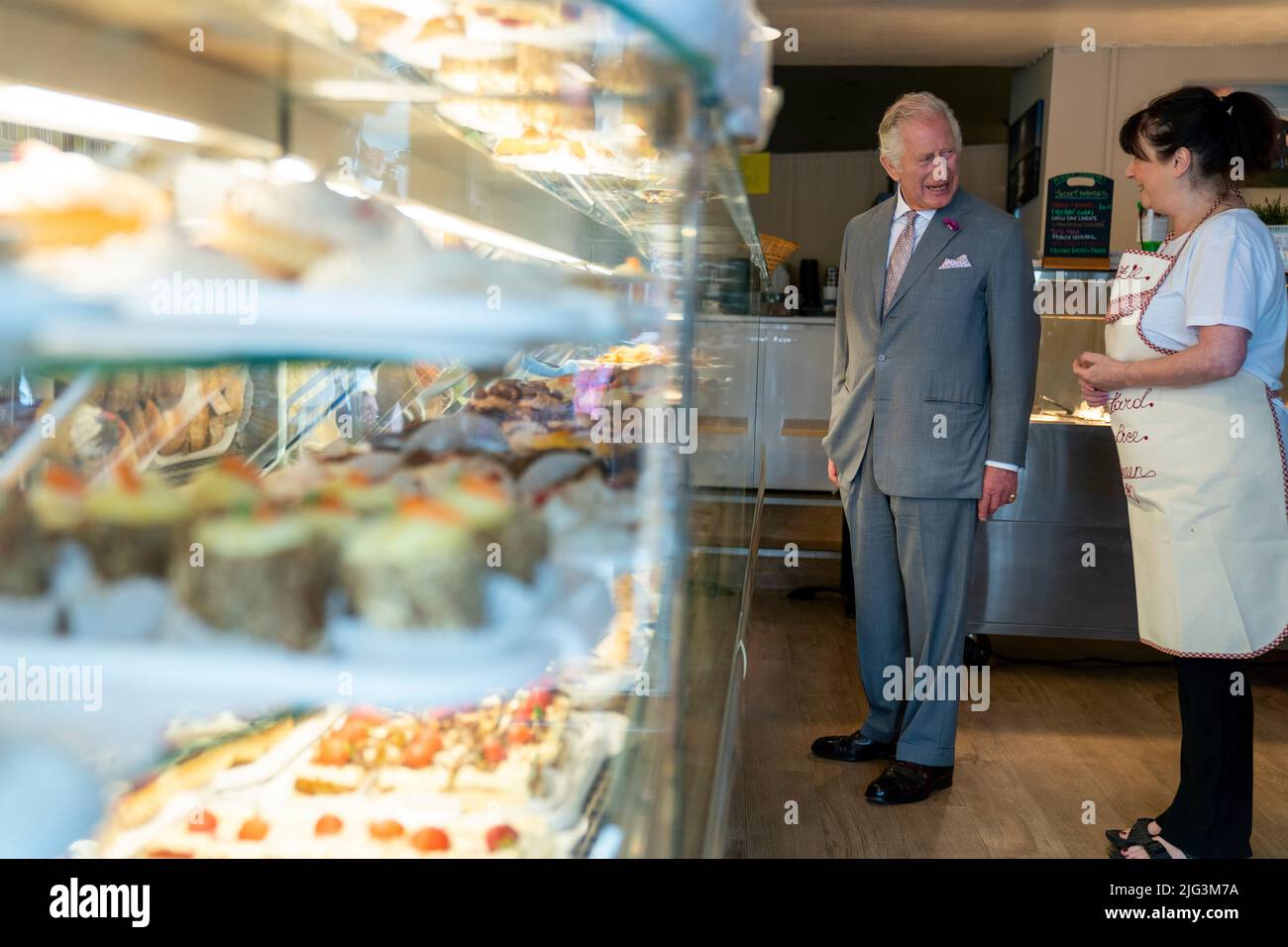 The Prince of Wales visits Liz's Bakery during a visit to the market ...