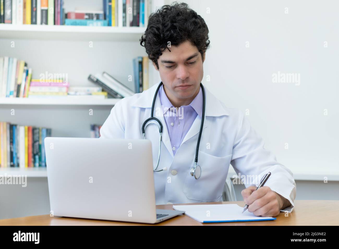 Mature adult doctor working online hi-res stock photography and images ...