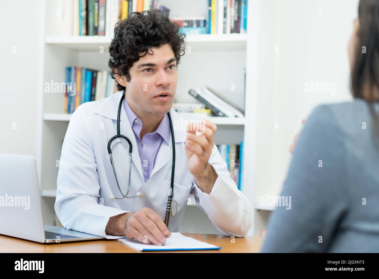 Mature oncologist talking man woman hi-res stock photography and images ...