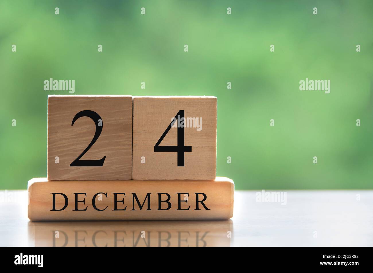 December 24 calendar date text on wooden blocks with copy space for ...