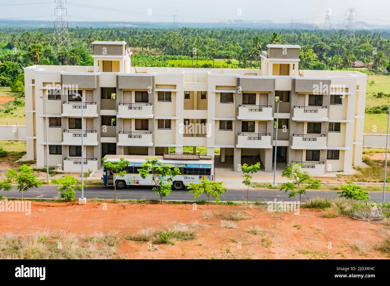 Top view of an Indian colony with bitumen road , building looking in ...